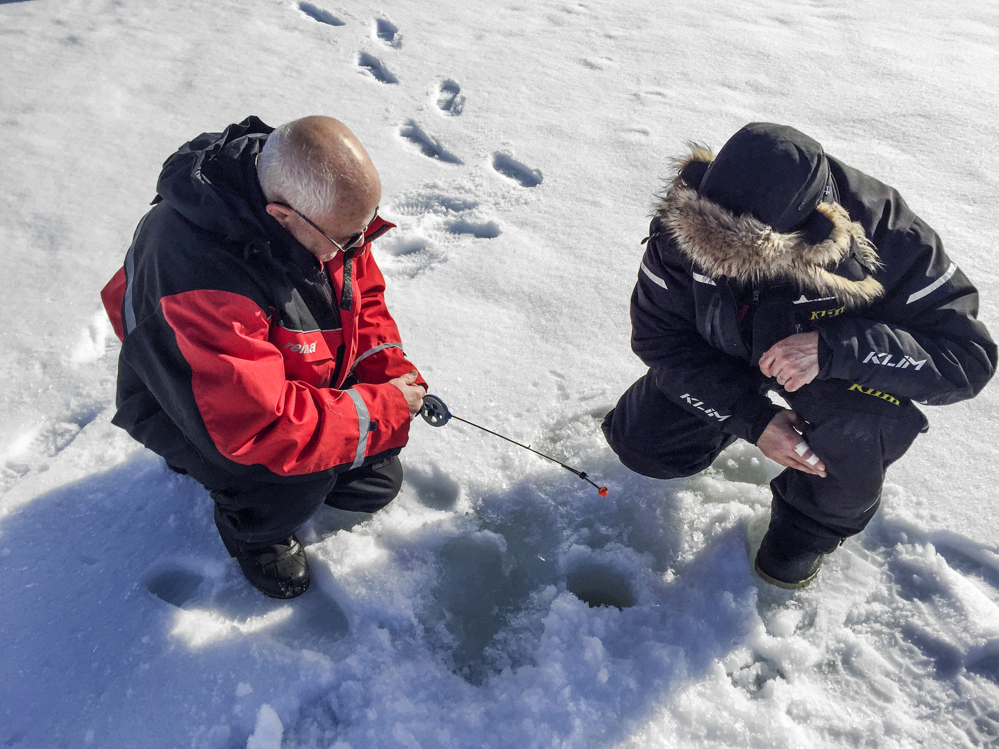 Ice Fishing Experience by Minivan - Visit Rovaniemi